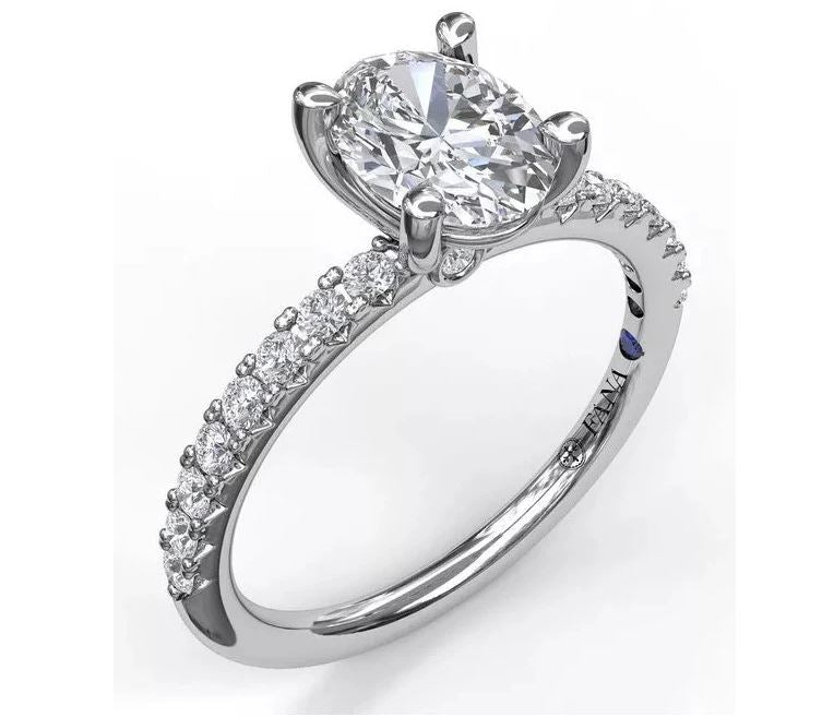 Classic Single Row Engagement Ring with an Oval Center Diamond – Hale's ...